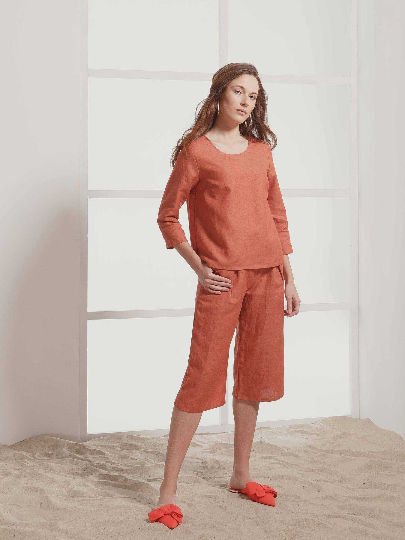 Terracotta color blouse with three-quarter sleeves